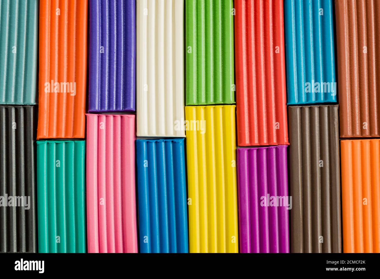 Rainbow colors of modeling clay. Multicolored plasticine bars ...
