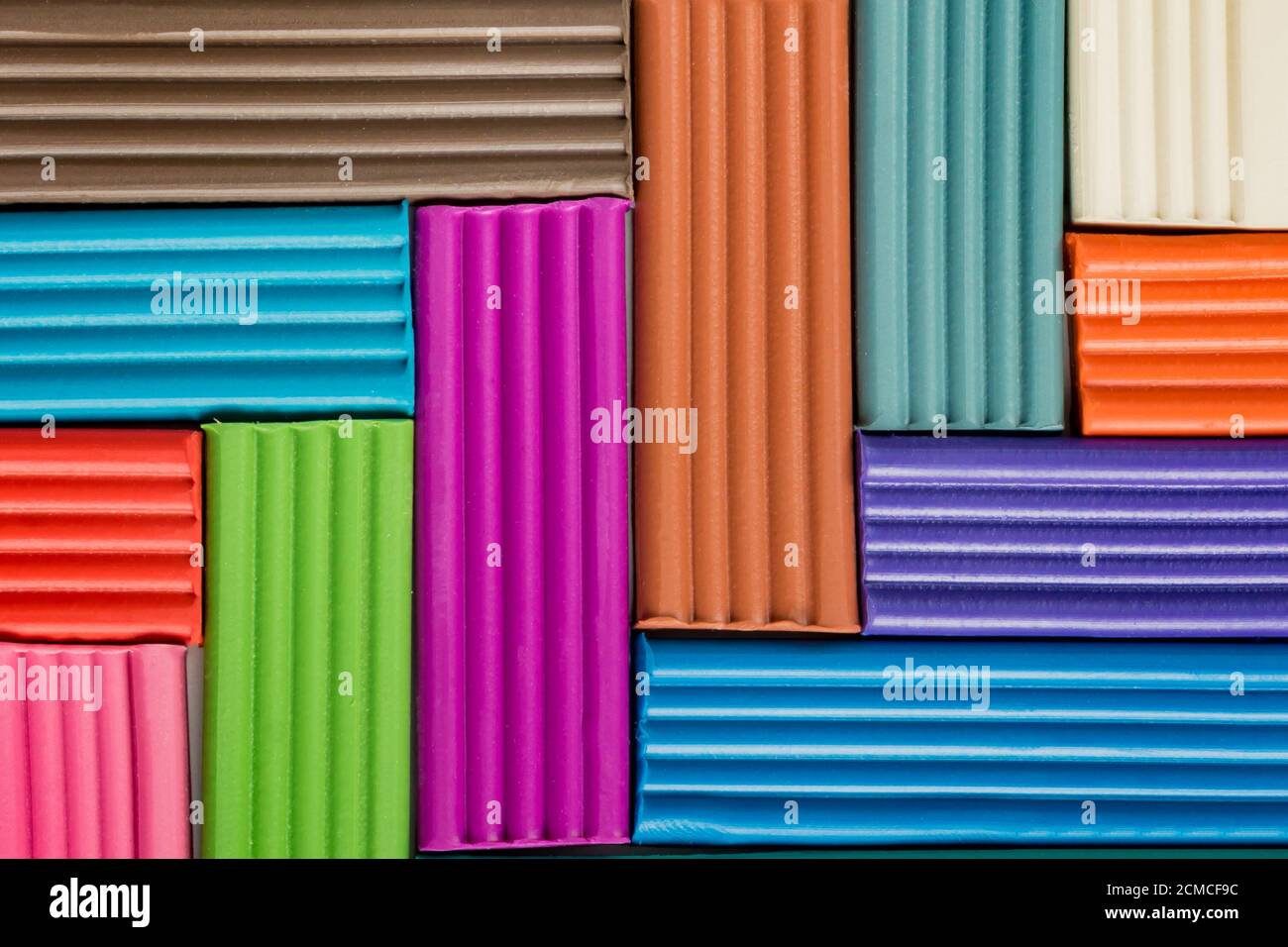 Rainbow colors of modeling clay. Multicolored plasticine bars ...