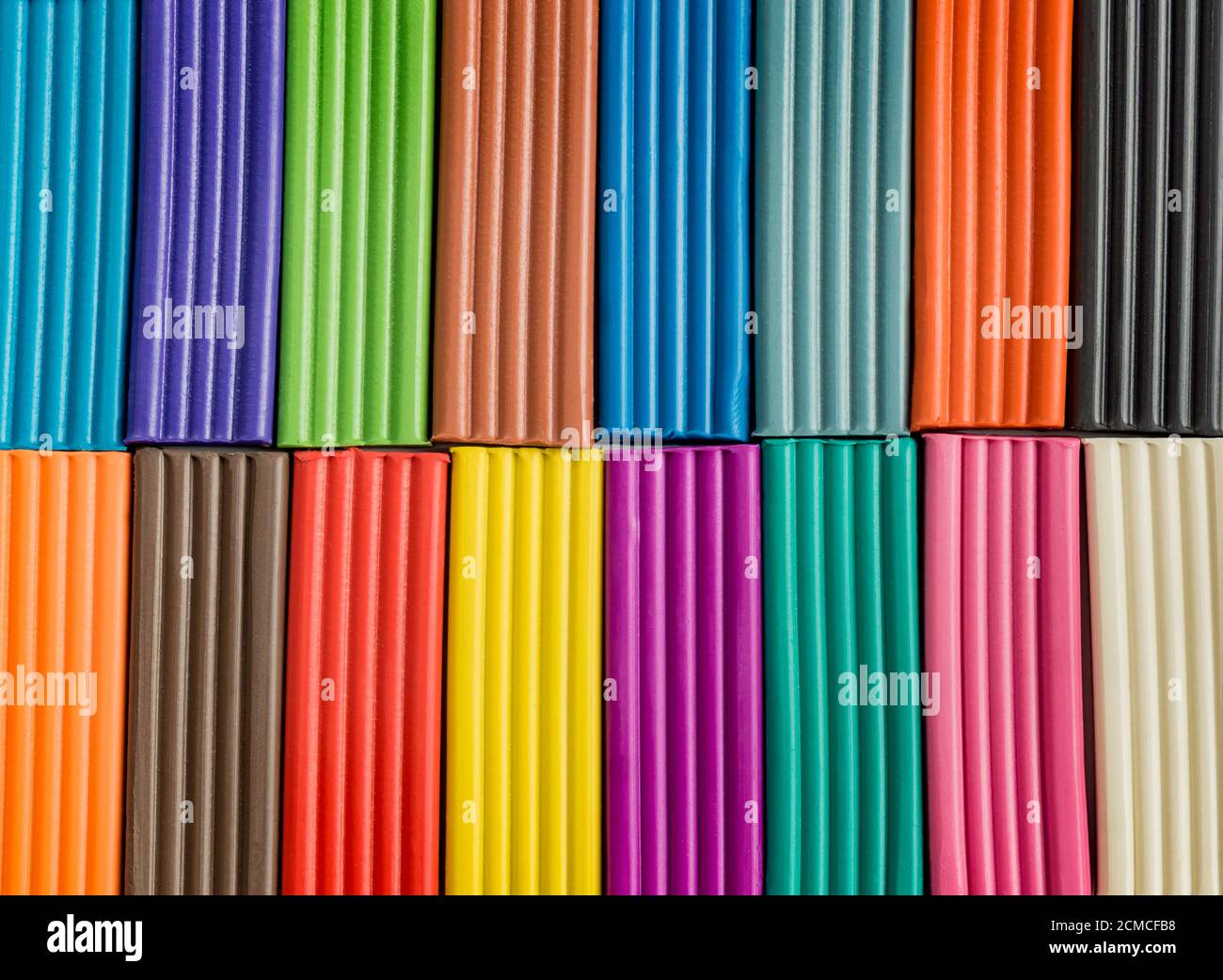 Rainbow colors of modeling clay. Multicolored plasticine bars ...