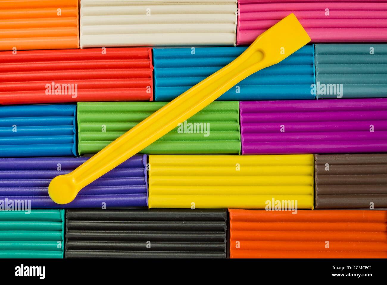 Rainbow colors of modeling clay. Multicolored plasticine bars ...