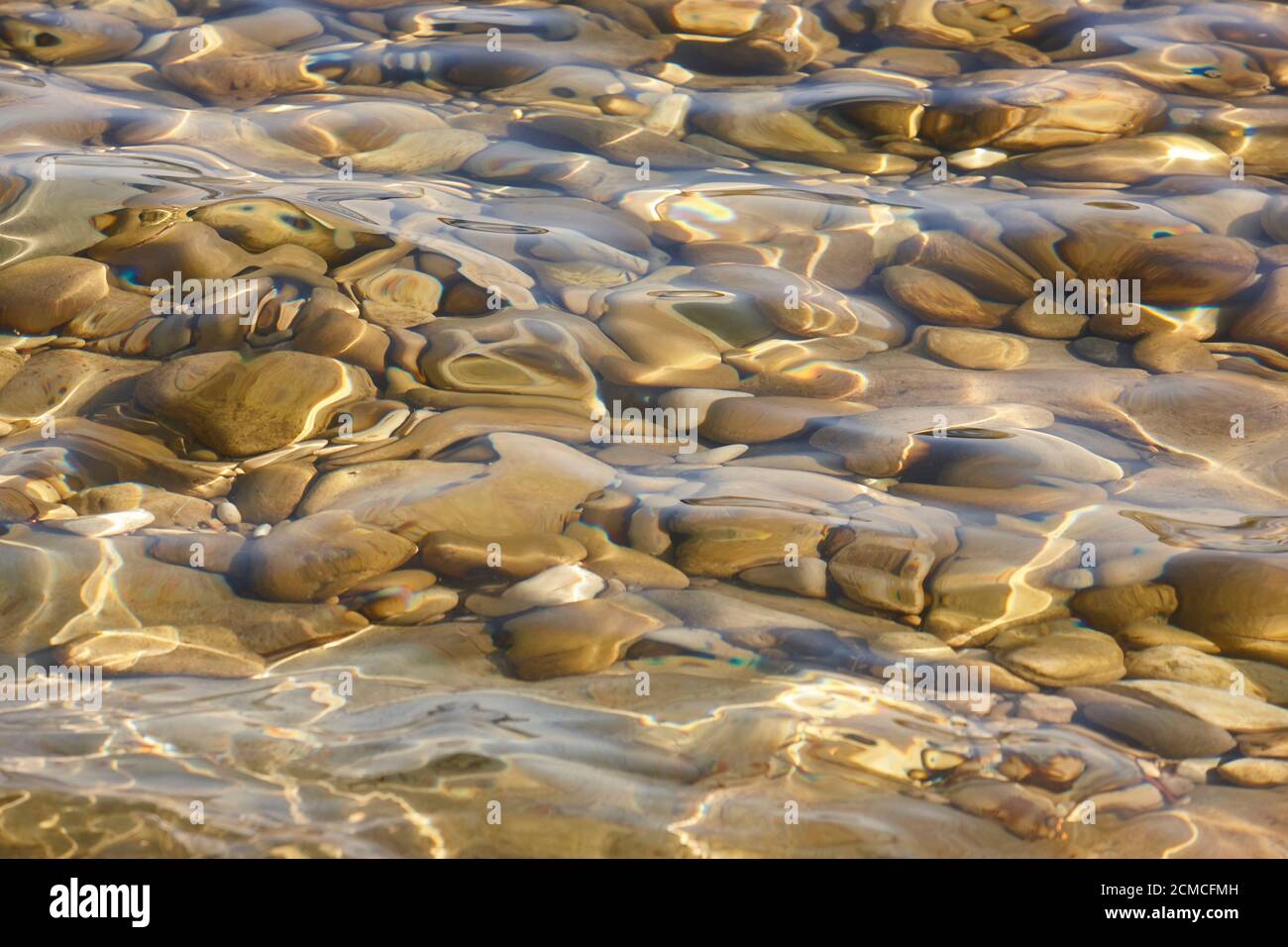 Pebble stone reflections on the water. Nature background. Zen ...