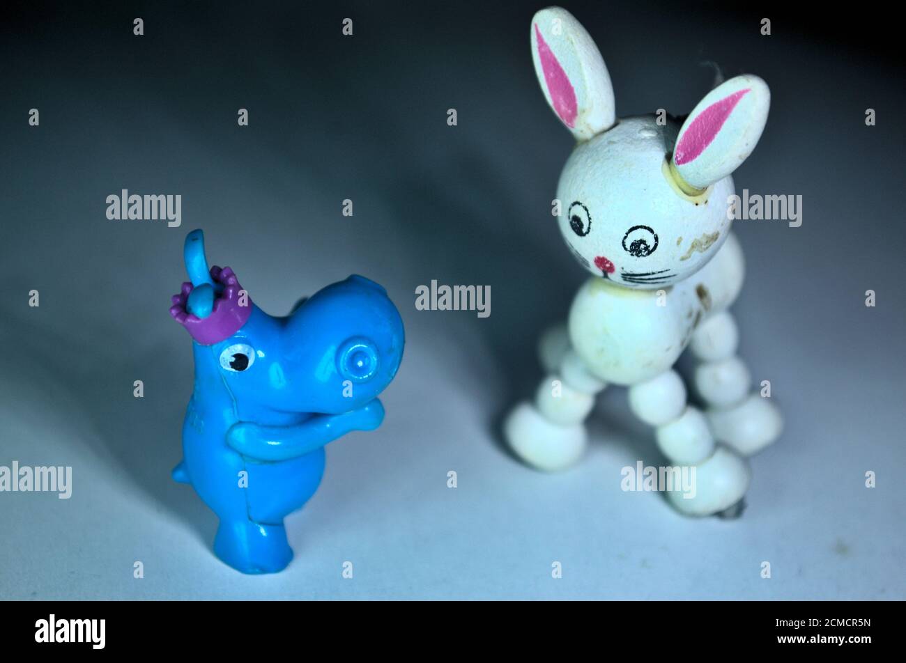 cute kids toys interacting Stock Photo - Alamy
