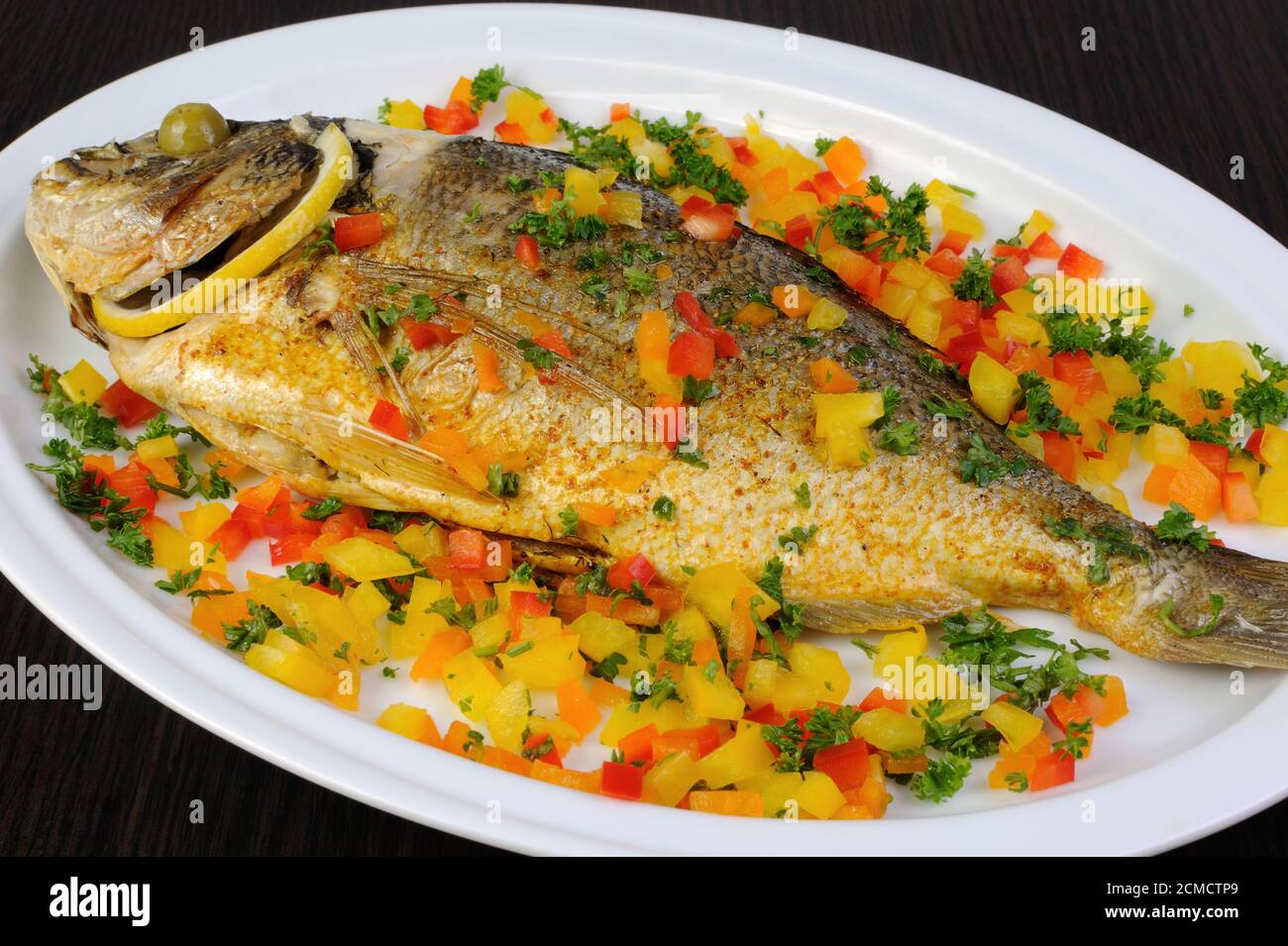 baked fish Dorado Stock Photo - Alamy
