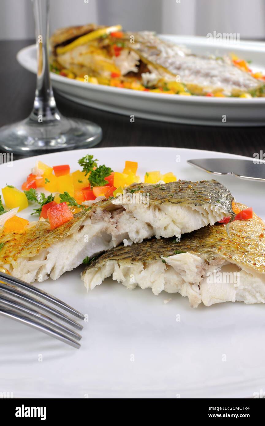 Slices of baked fish Dorado Stock Photo - Alamy
