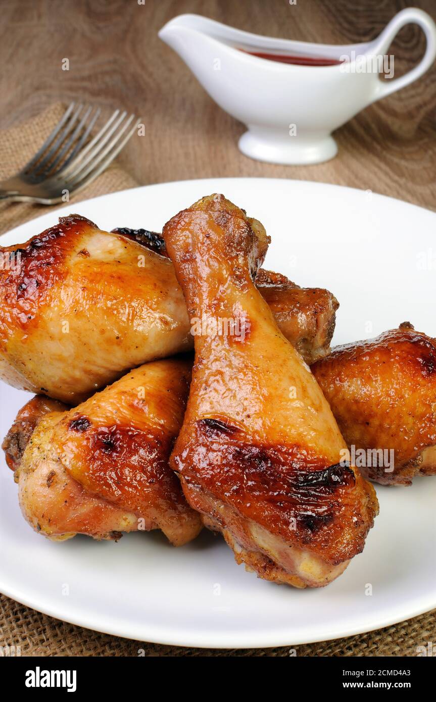 Baked chicken leg Stock Photo - Alamy