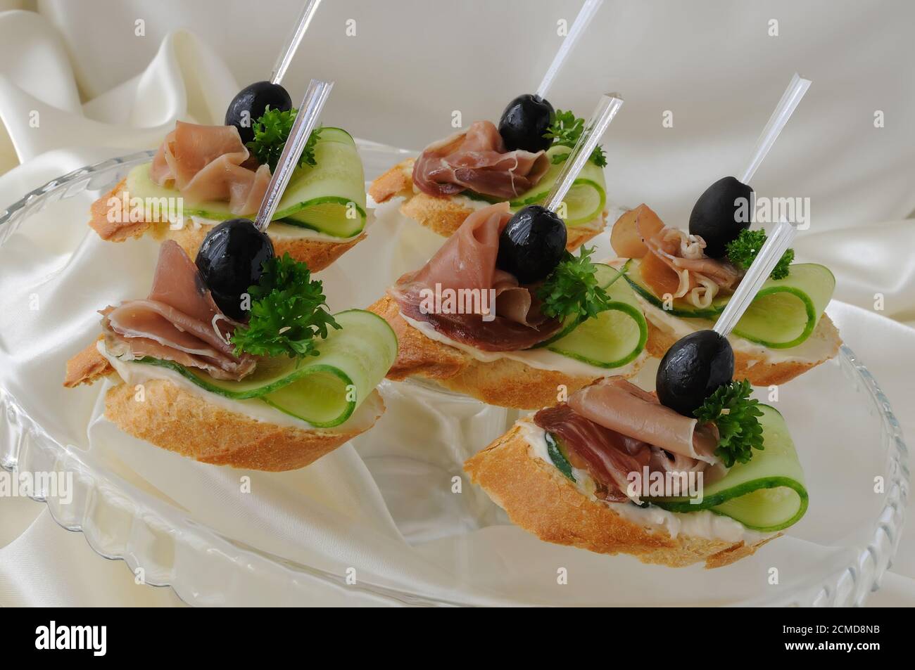 Canapes with ham Stock Photo - Alamy