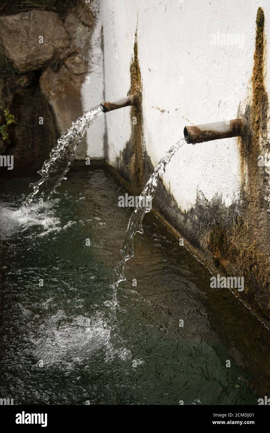 High mountain spring water jet Stock Photo - Alamy