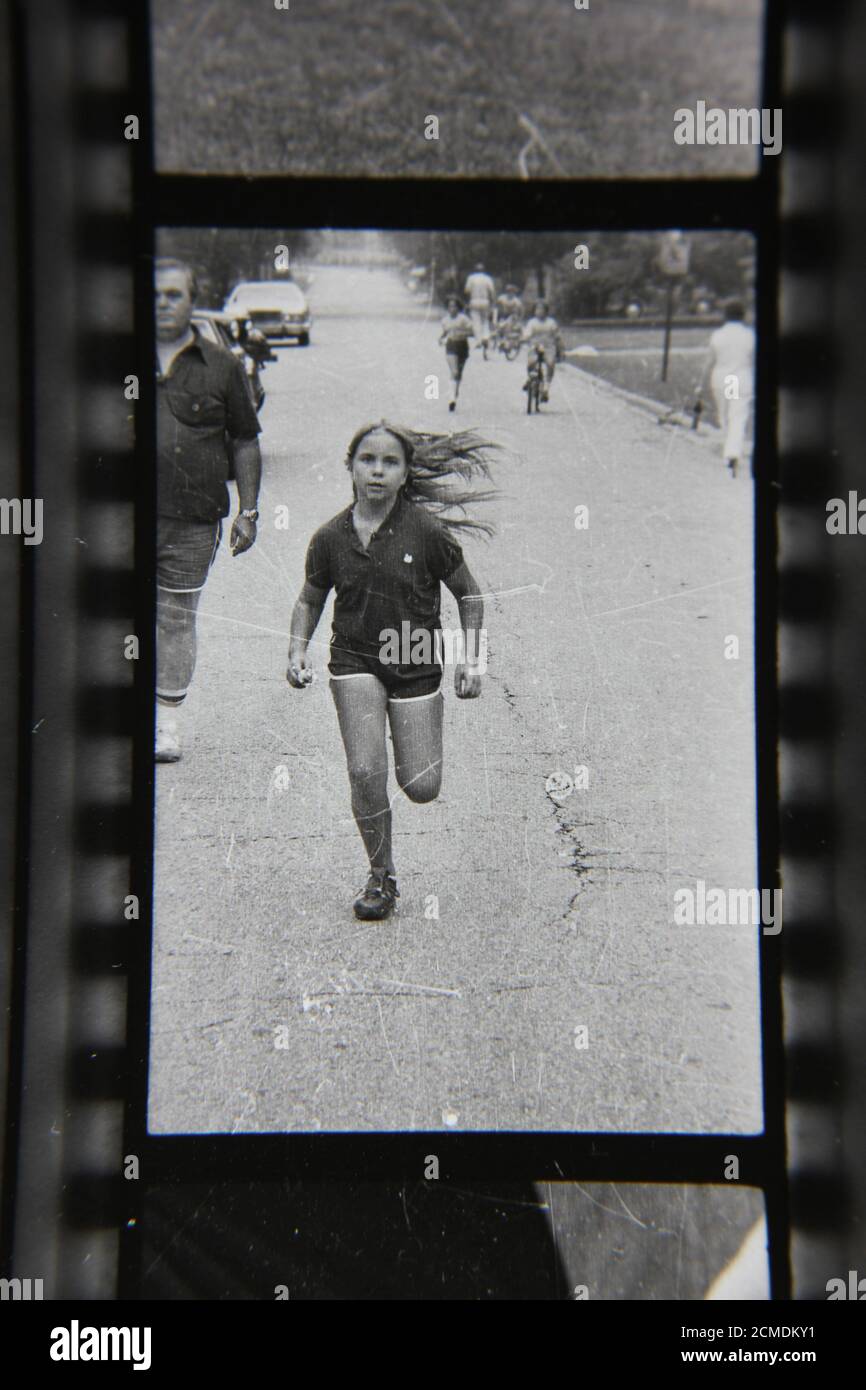 Running children 70s hi-res stock photography and images - Alamy