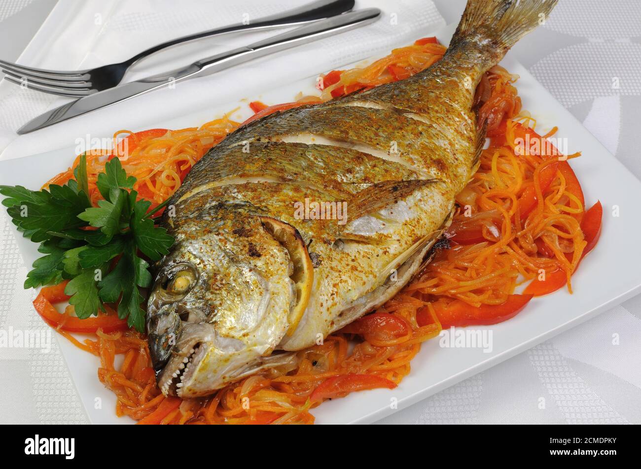 Dish fried dorado fish hi-res stock photography and images - Alamy