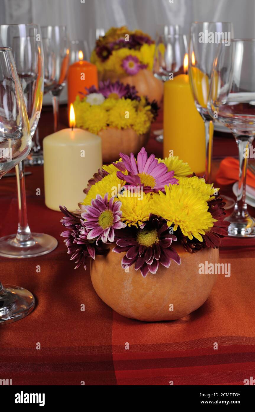 Motives of autumn in the design of the dining table Stock Photo - Alamy