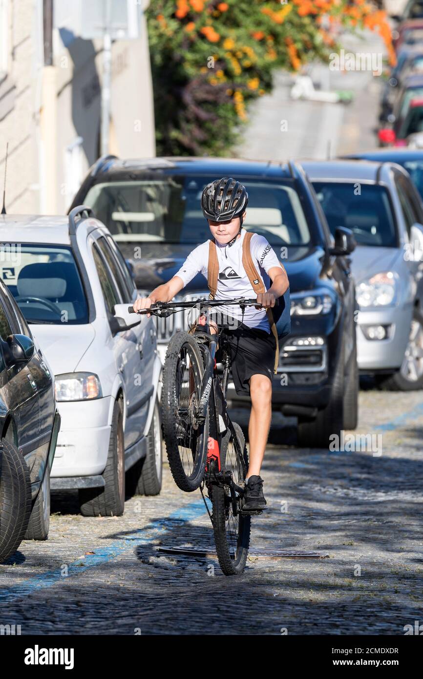 Using a bicycle hi-res stock photography and images - Alamy