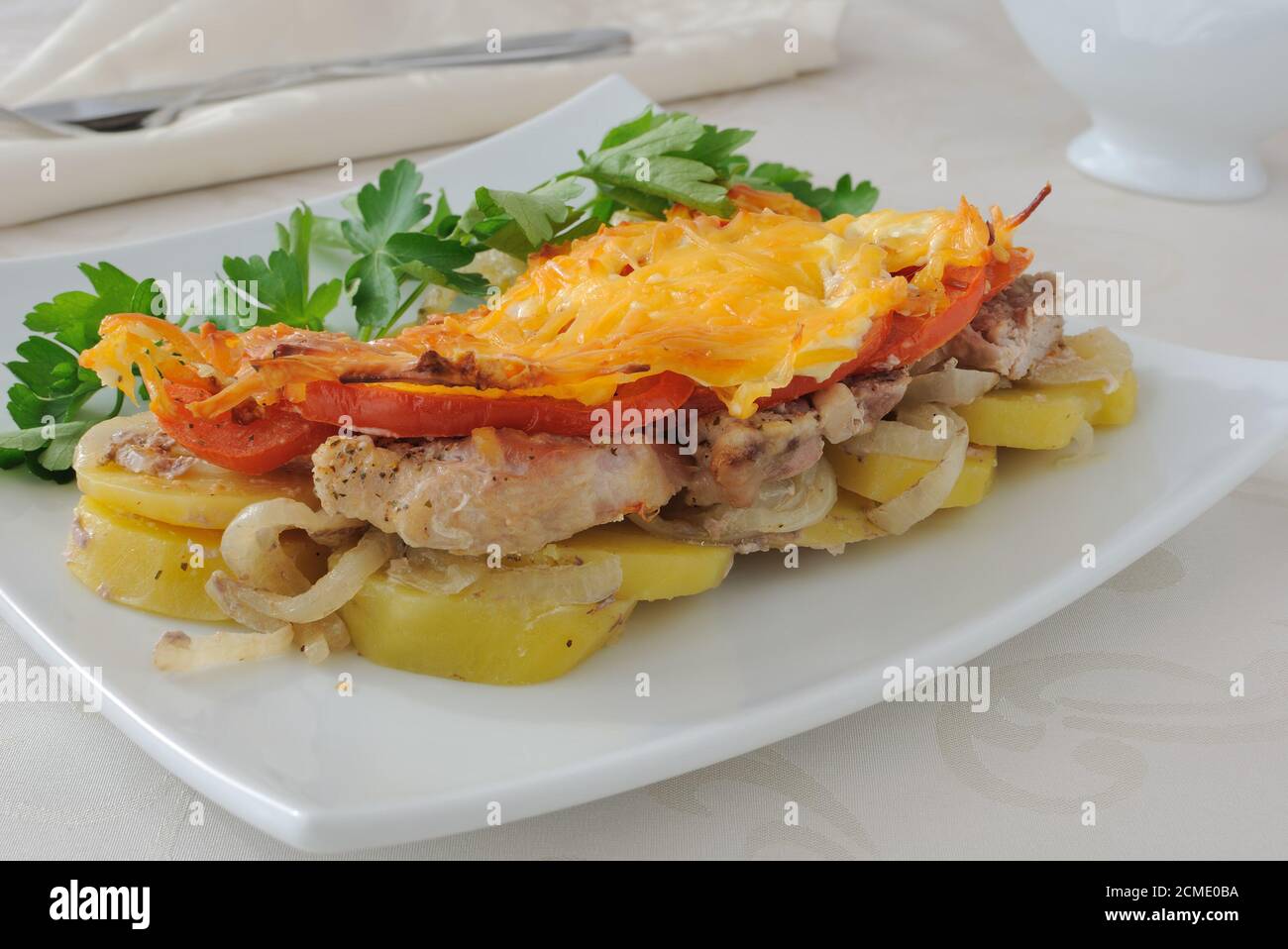 Meat and cheese with potatoes Stock Photo - Alamy