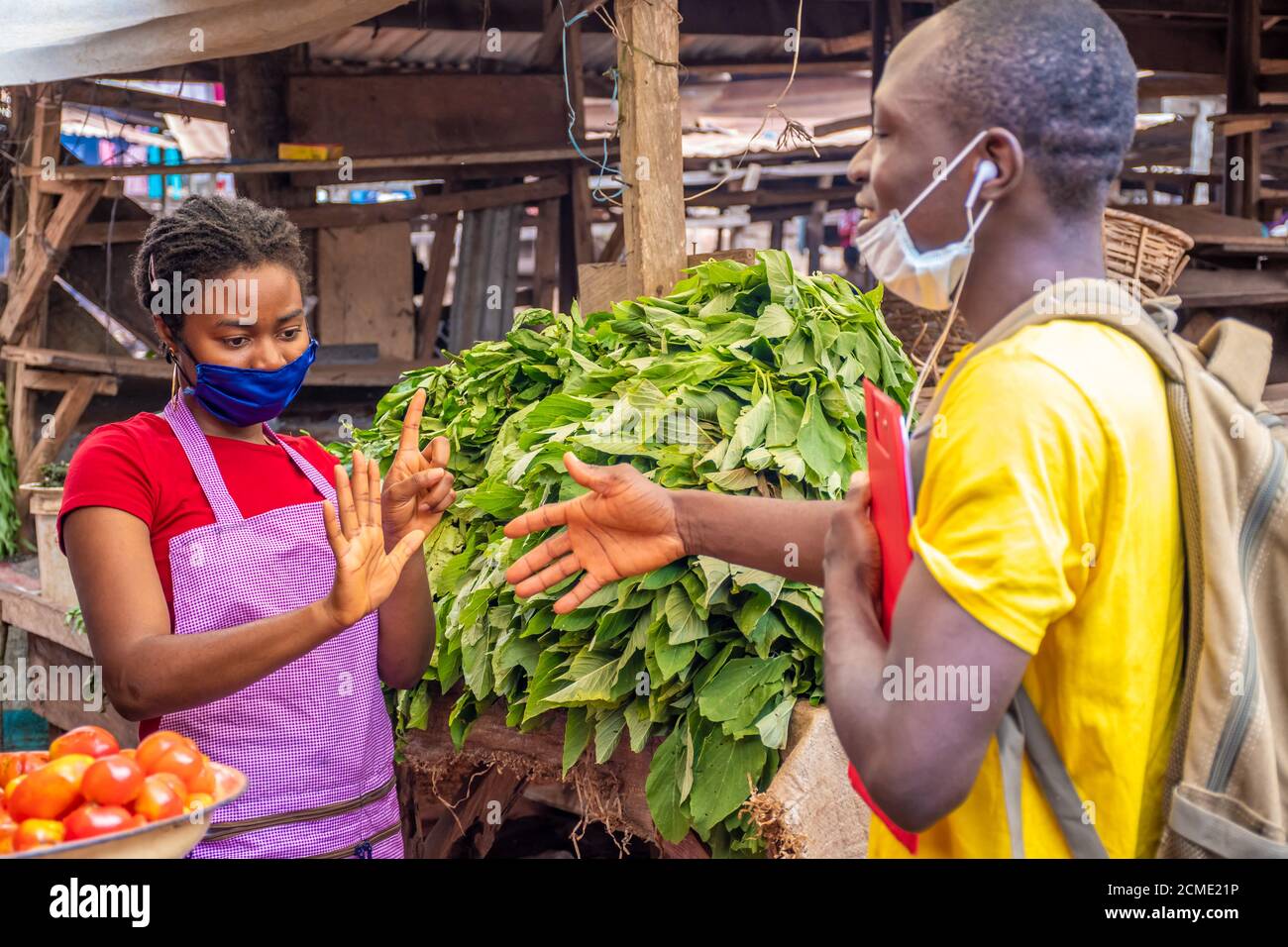 Africa worker hand shake hi-res stock photography and images - Alamy