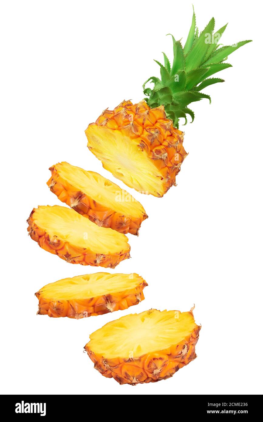 falling pineapple slices isolated on white background with full depth ...