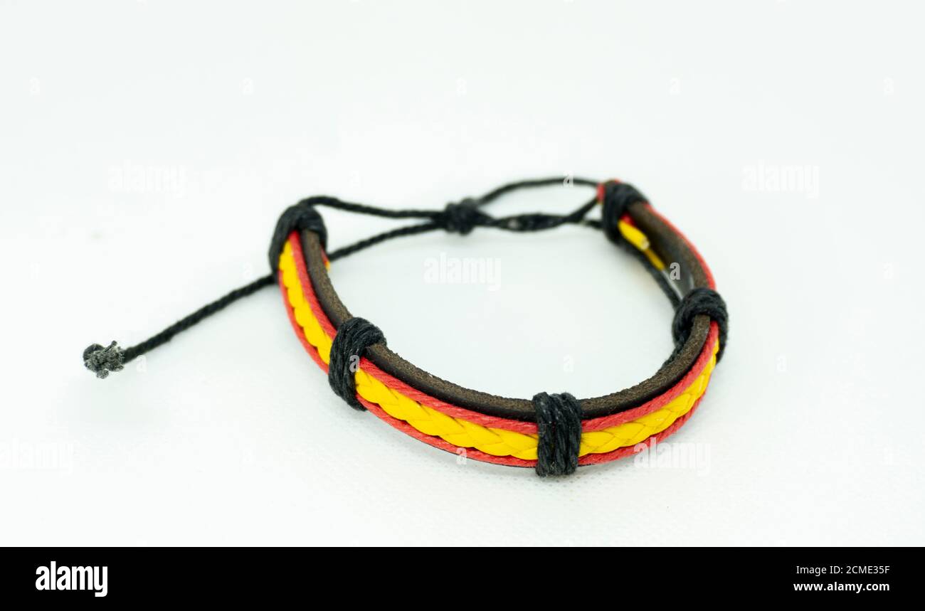 leather bracelet with the flag of spain Stock Photo - Alamy