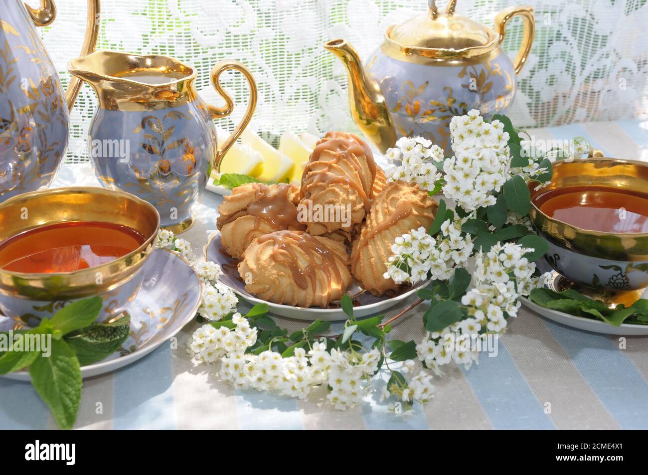 Morning tea with biscuits Stock Photo - Alamy