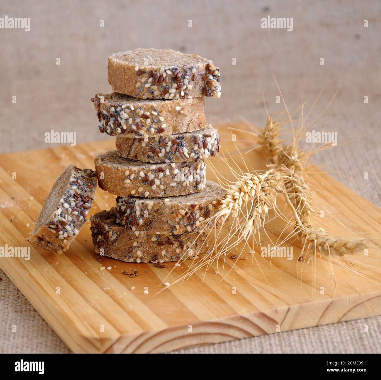 A stack of slices of bread with grains Stock Photo - Alamy