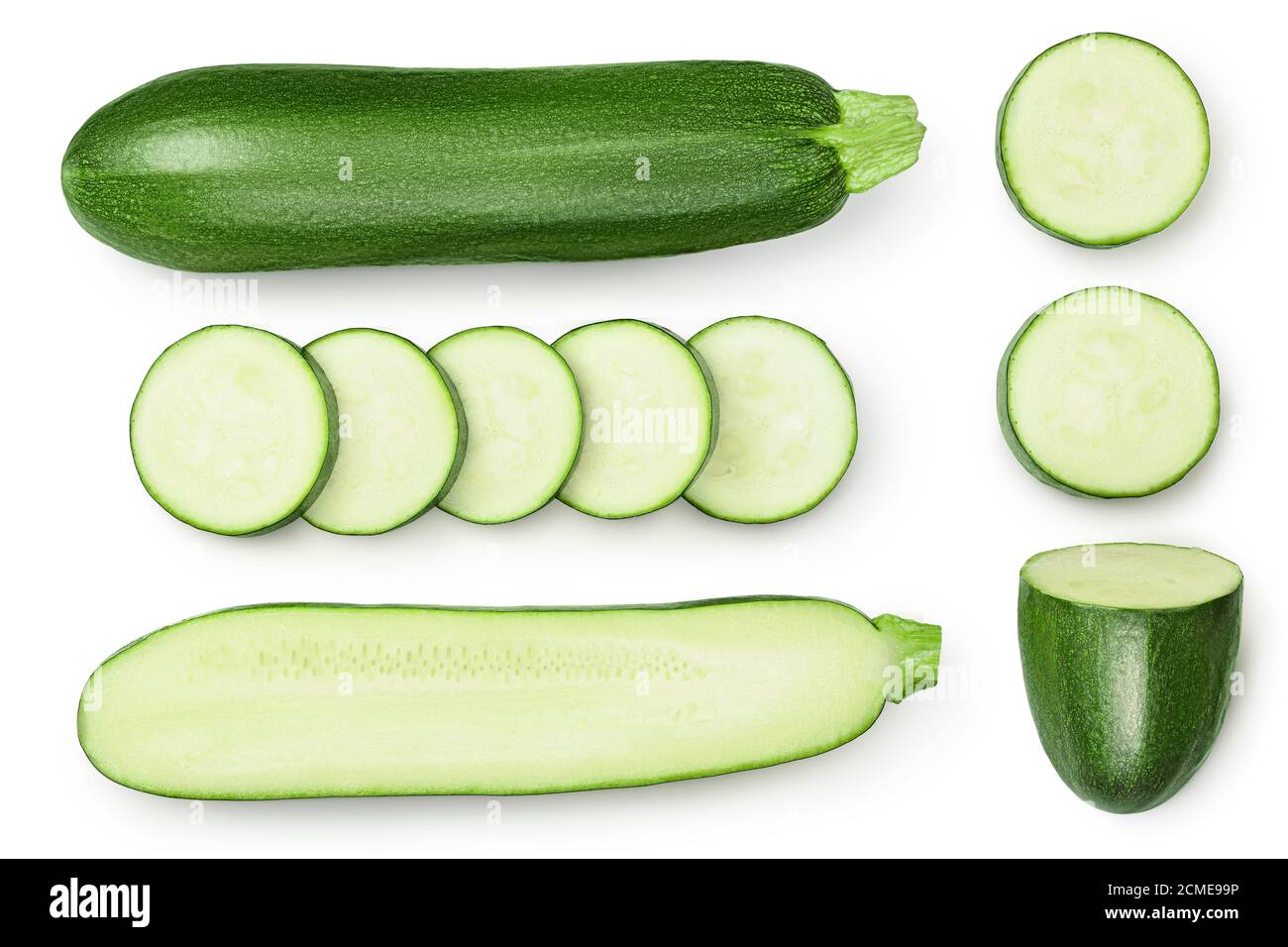 Fresh whole and sliced zucchini isolated on white background with ...