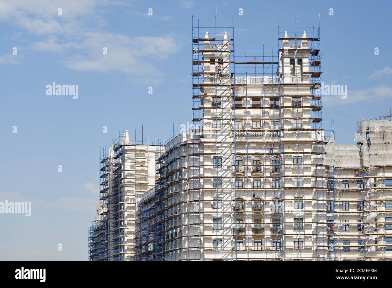 Part of the high-rise building in scaffolding Stock Photo - Alamy