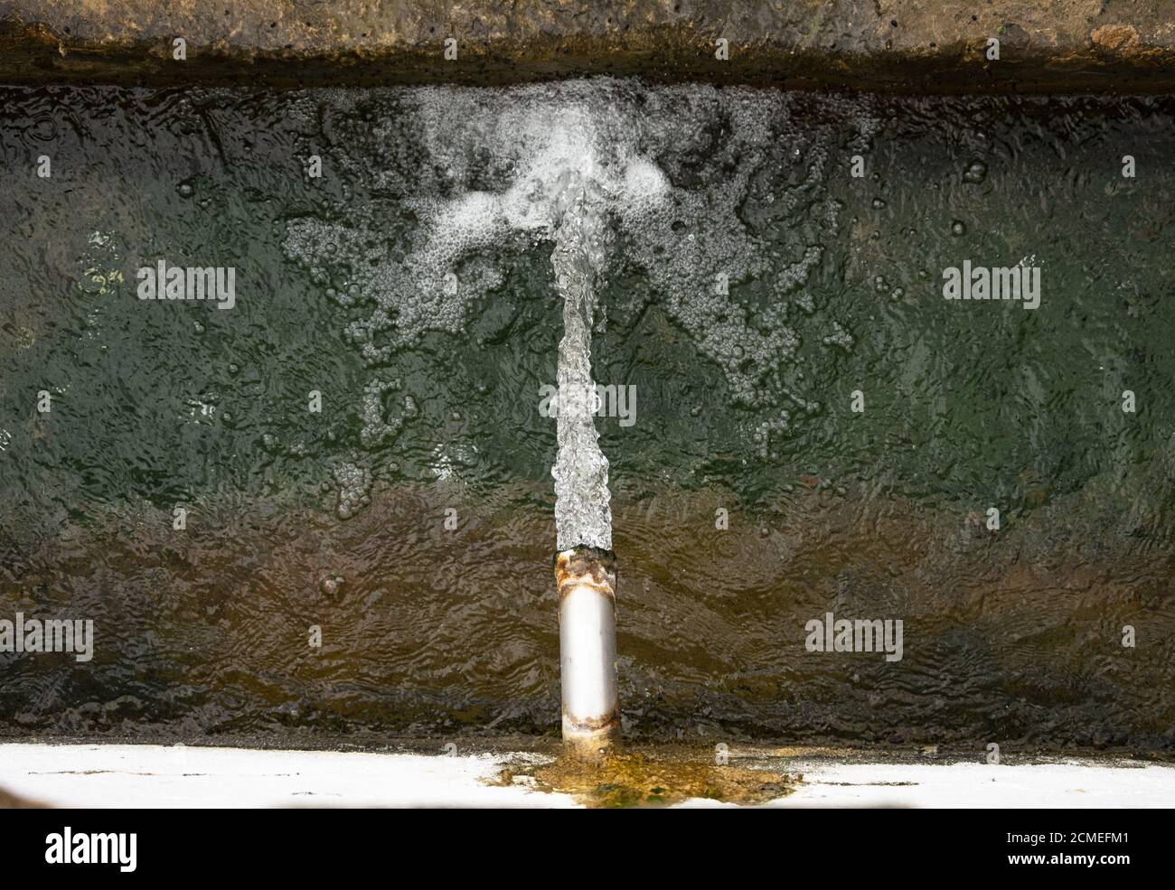 High mountain spring water jet Stock Photo - Alamy