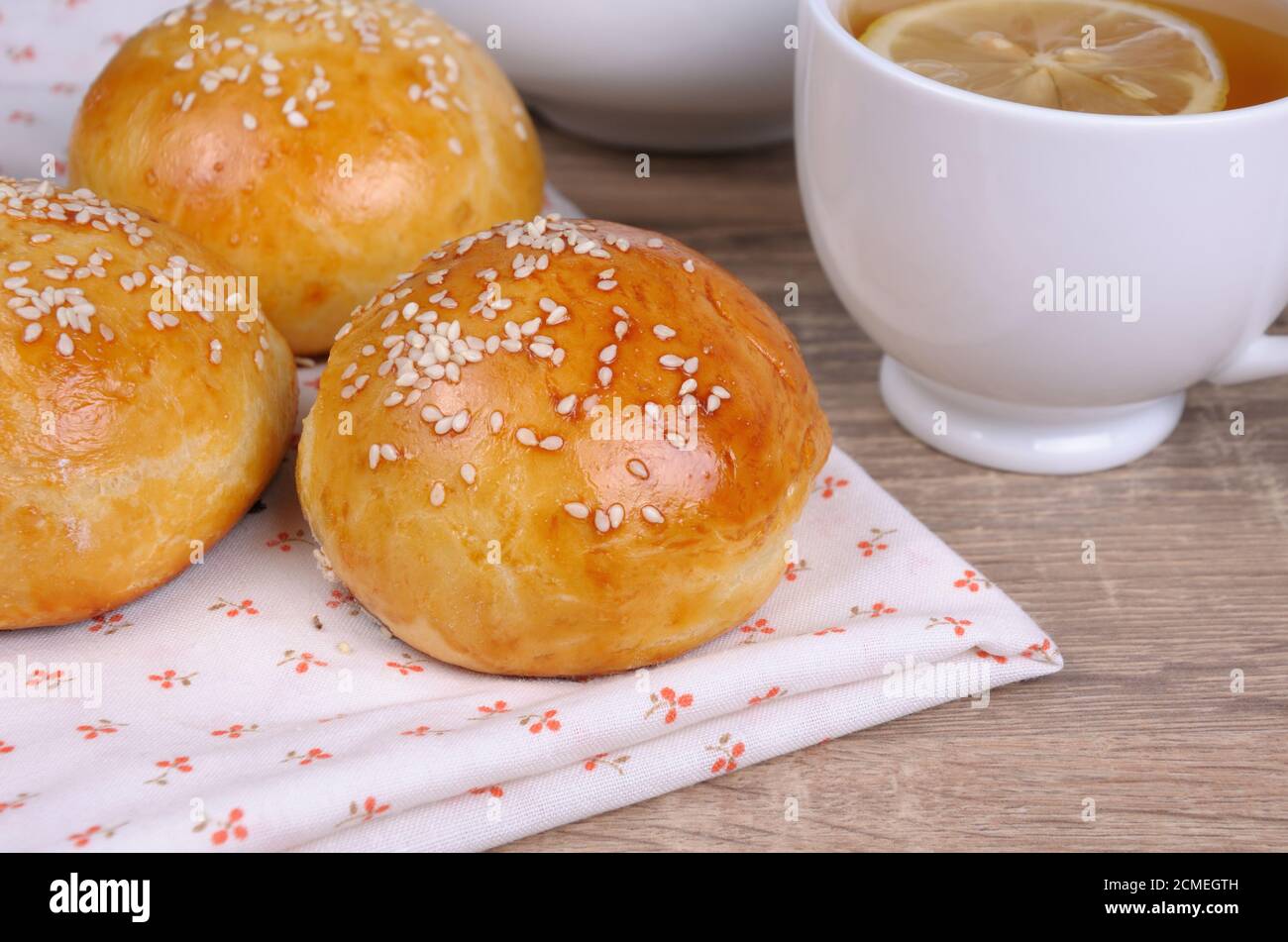 Buns with sesame seeds Stock Photo - Alamy