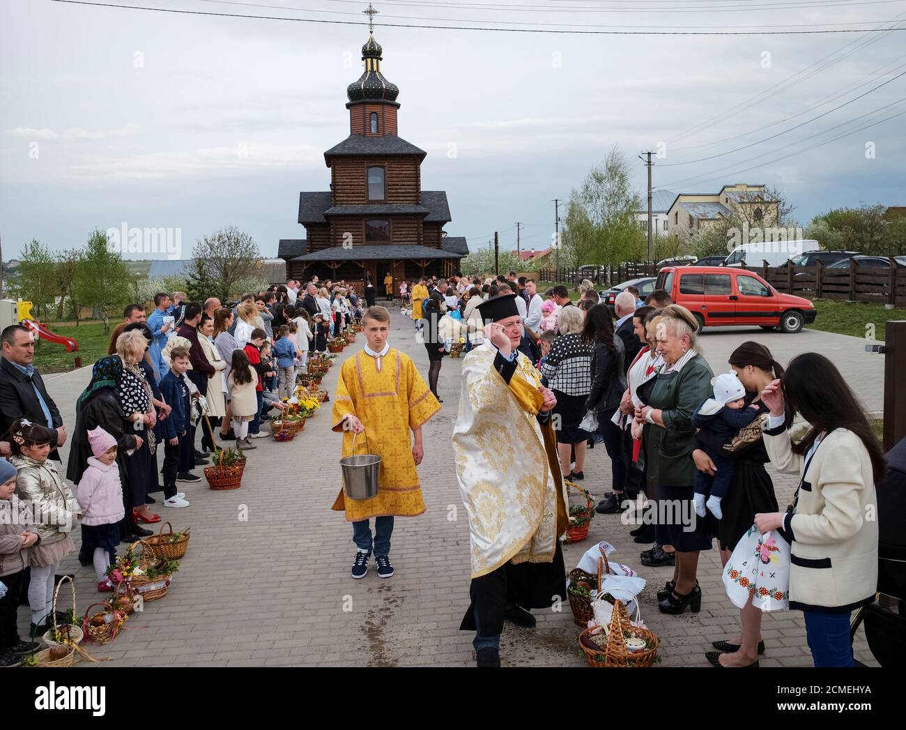 Catholic priest sprinkles holy water hi-res stock photography and ...
