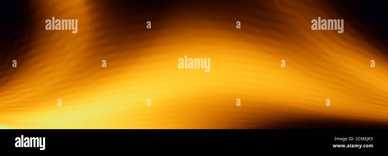 Golden flow art energy texture smooth background Stock Photo - Alamy