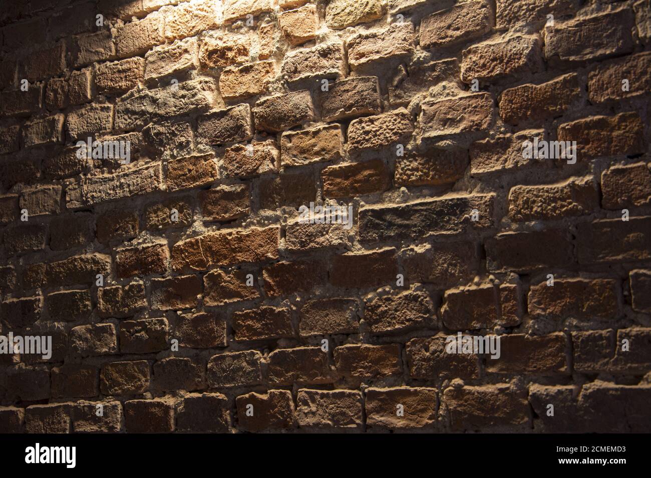 Illuminated brick wall Stock Photo - Alamy