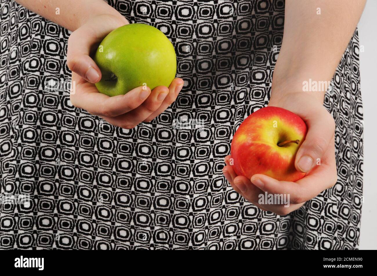 Two Hands Touching A Apple