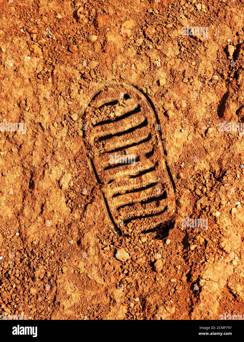 Astronaut bootprint on red soil Mars style background Stock Photo - Alamy