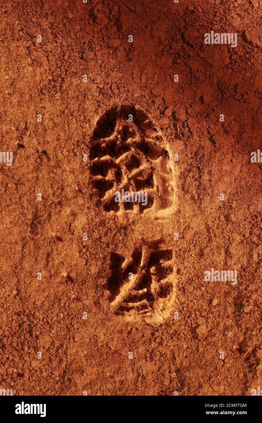 Astronaut footprint in the red sand soil of the planet Mars Stock Photo ...