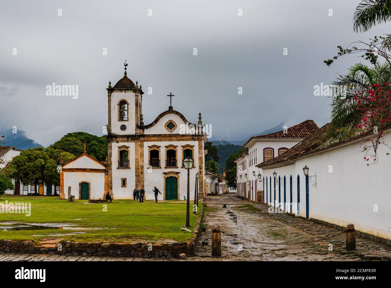 Front facade of old catholic church in a historical brazilian town ...