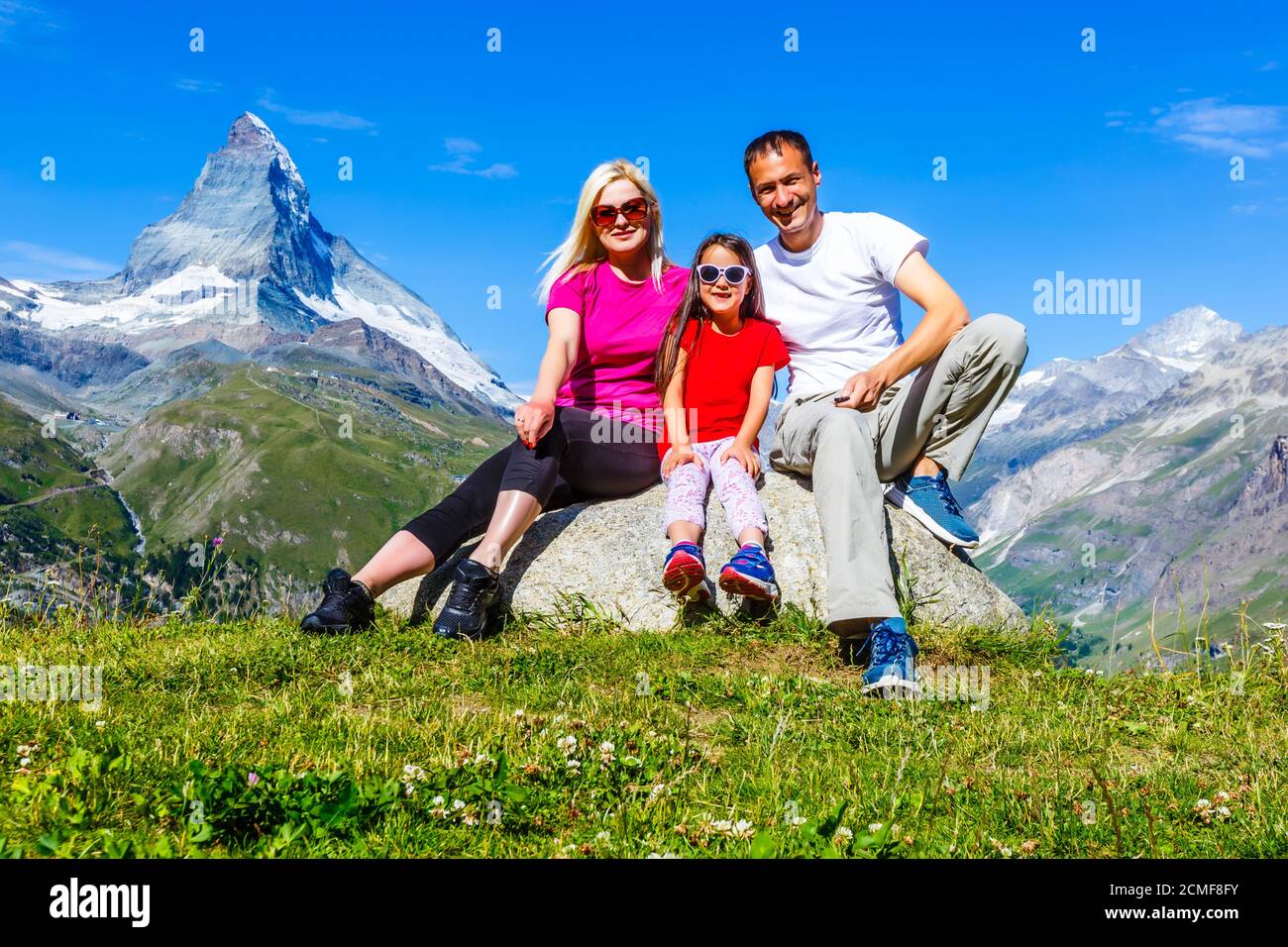 Family on their vacation in mountains Stock Photo - Alamy