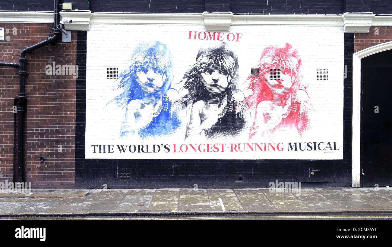woman cellist busking in London Underground Stock Photo - Alamy