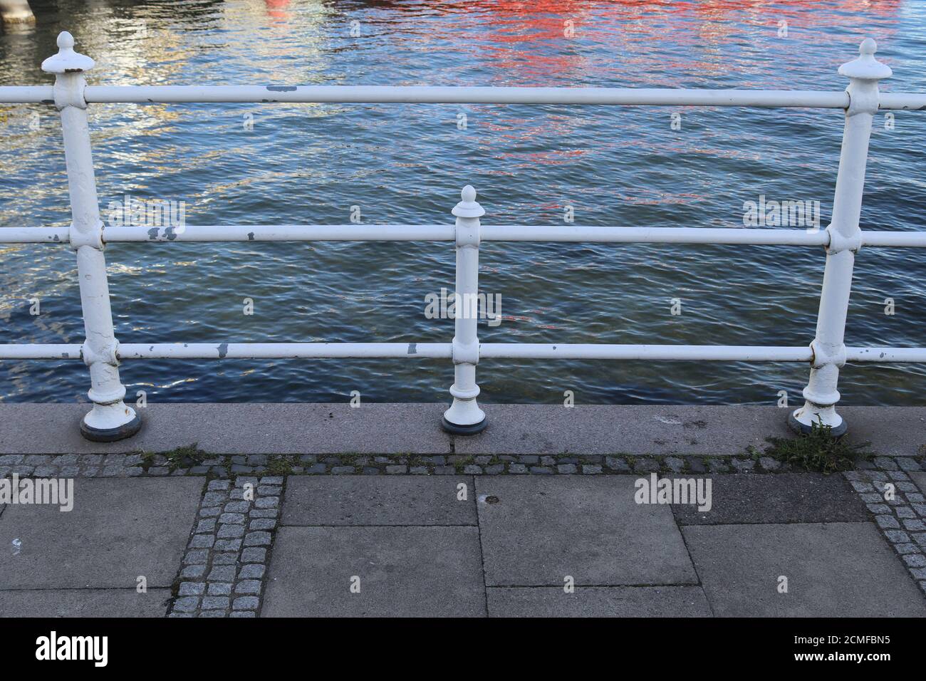Metal railings by the sea Stock Photo - Alamy