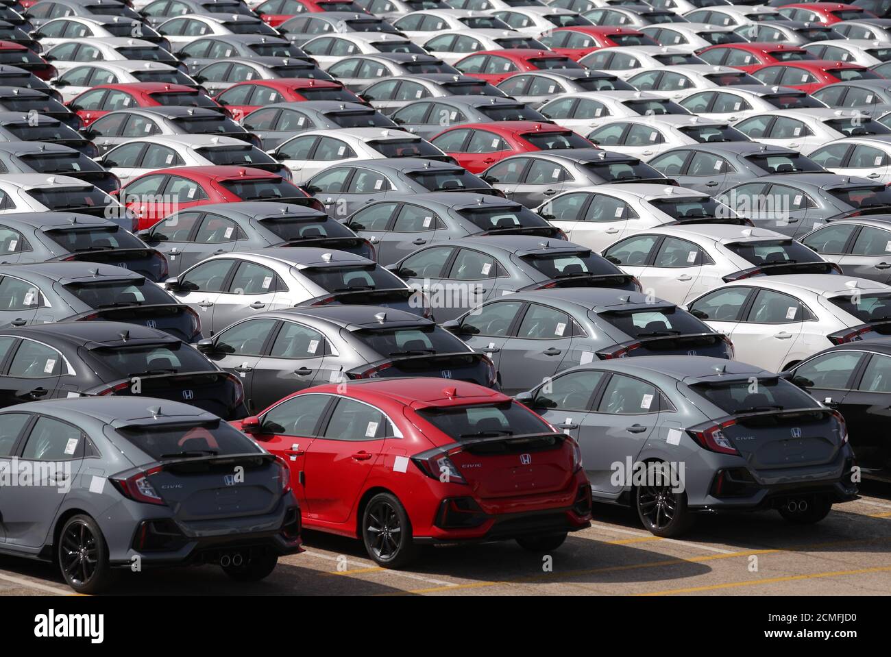 Honda cars are lined up at Southampton Docks prior to being loaded onto ...