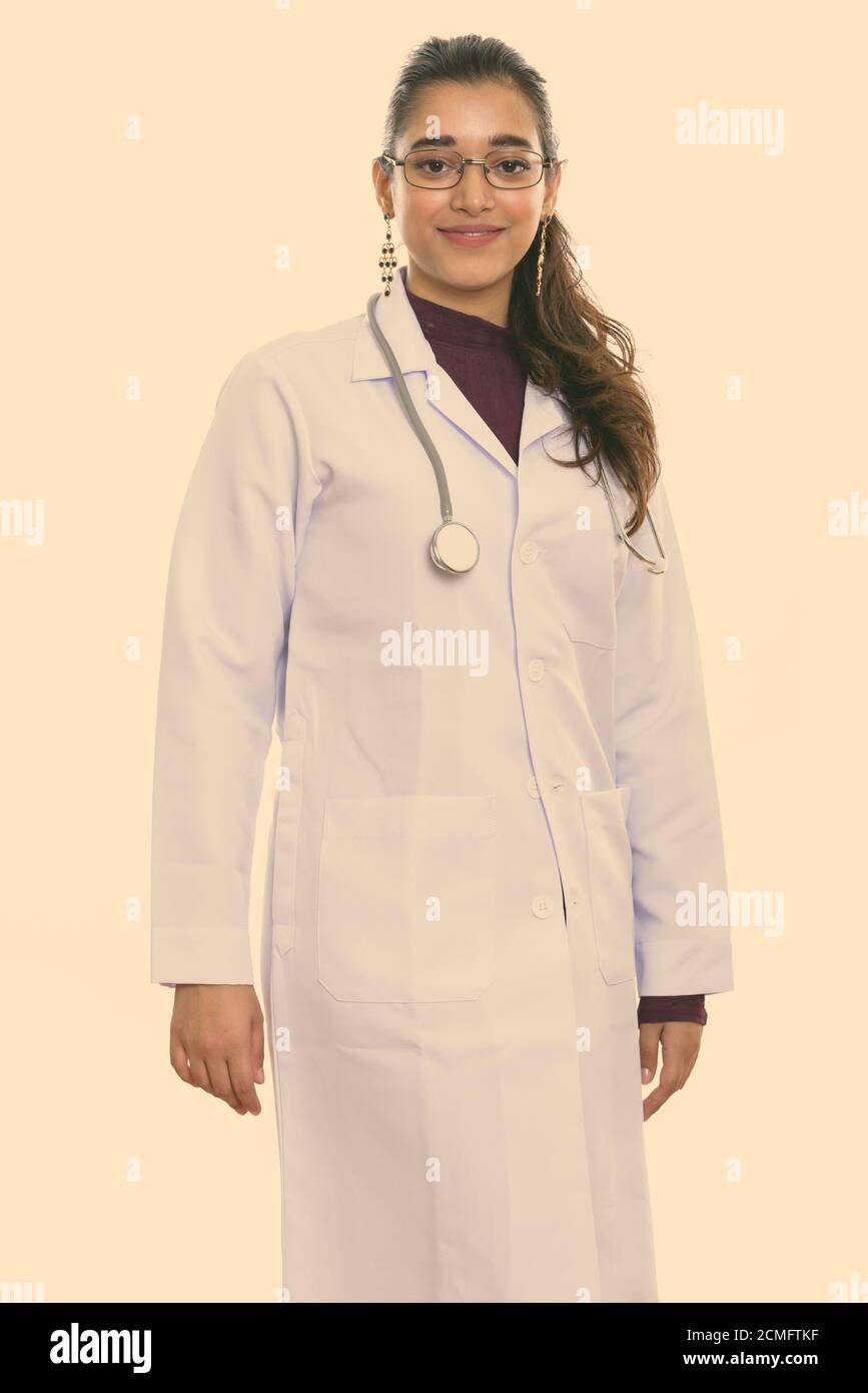 Smiling adult female doctor hi-res stock photography and images - Alamy