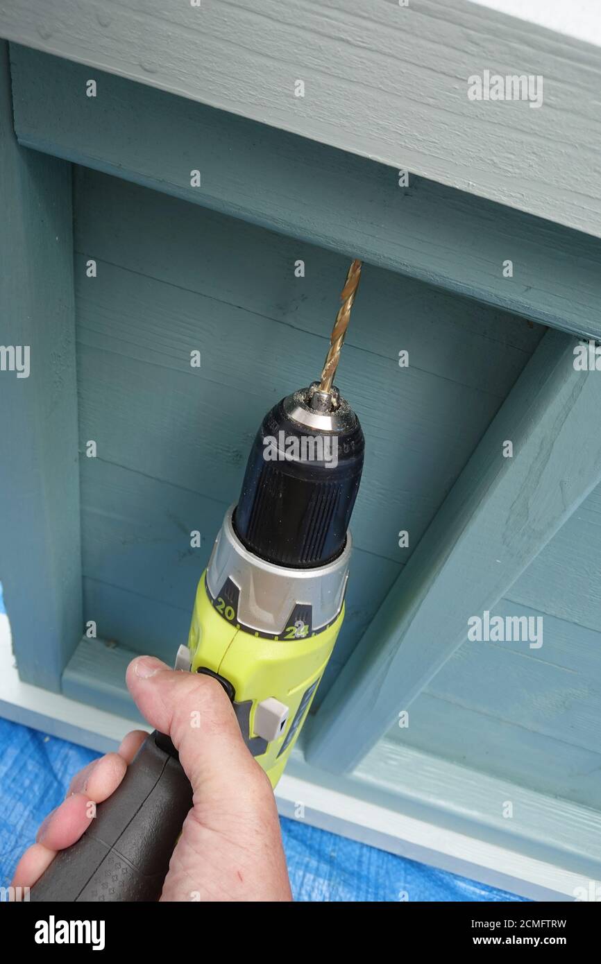 DIY project building garden furniture using cordless tools Stock Photo ...