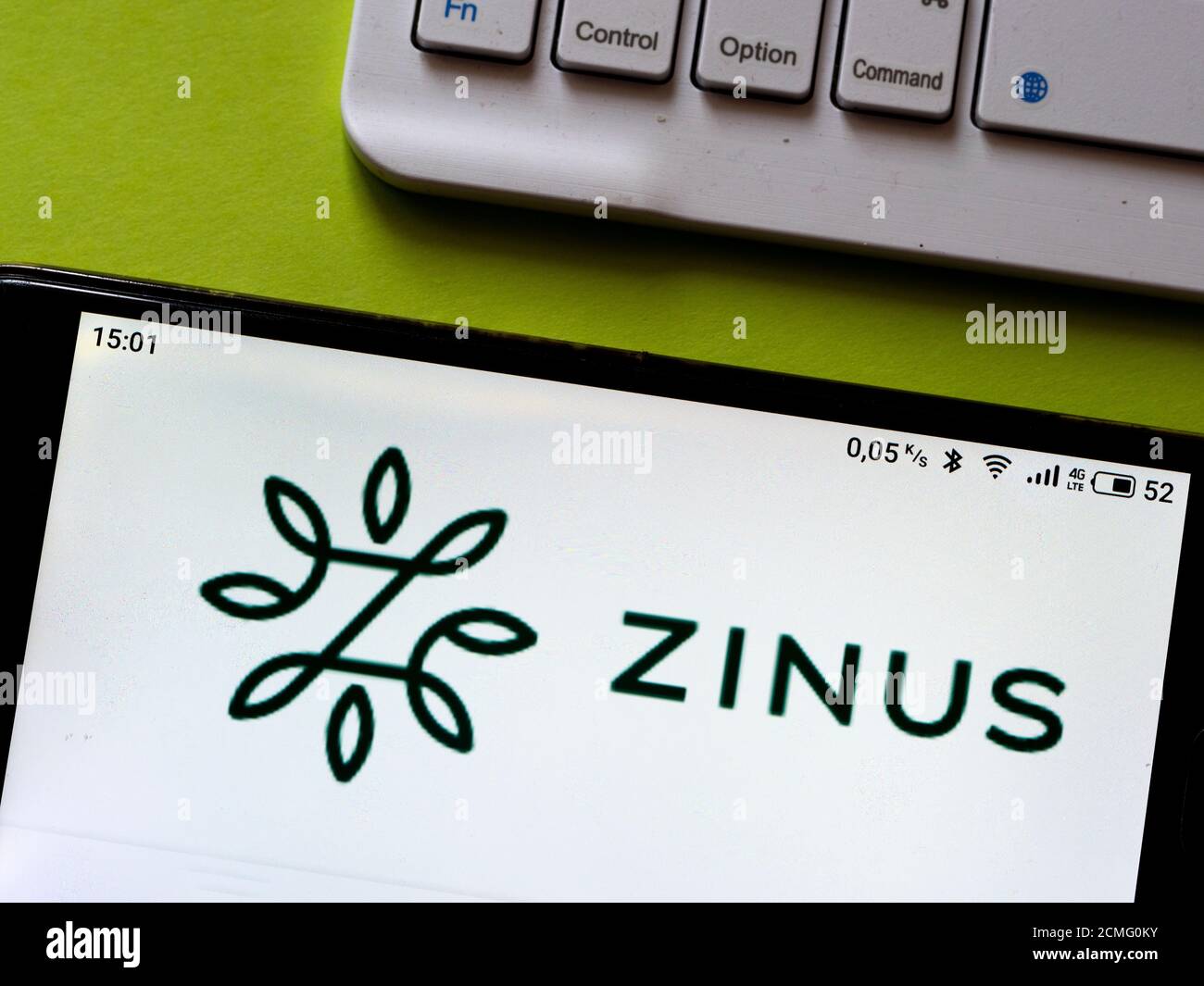 In this photo illustration a Zinus logo is seen displayed on a ...