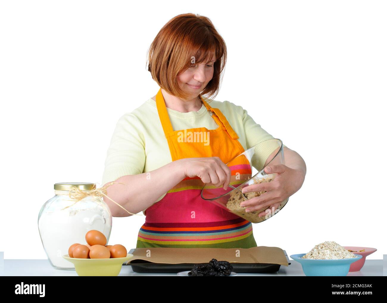 Middle aged woman stirs hi-res stock photography and images - Alamy