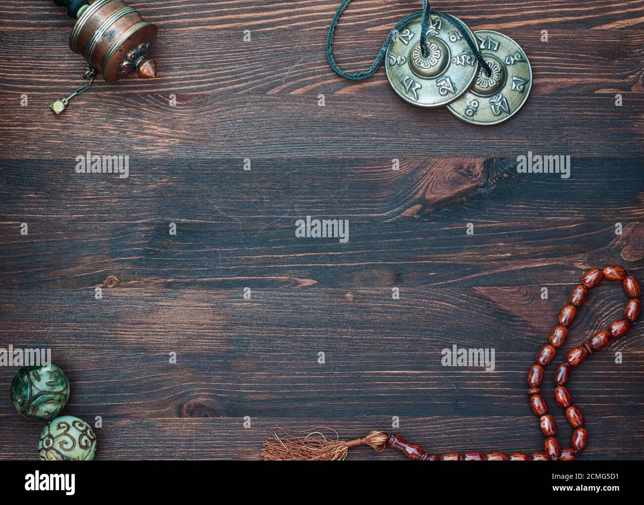 Prayer wheel, prayer beads, magic balls and brass plates for religious ...