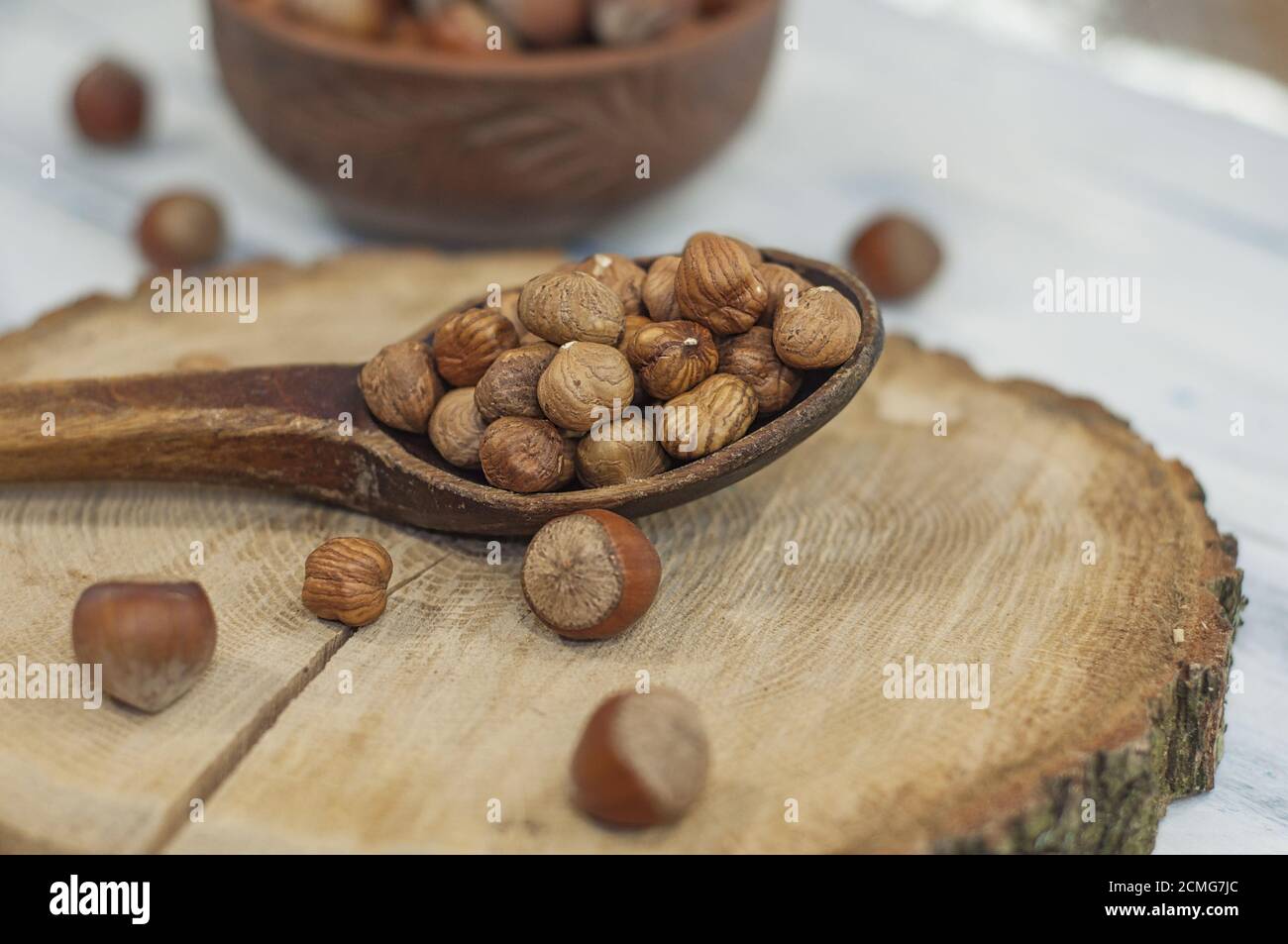 Wooden spoon shelled nuts hi-res stock photography and images - Alamy