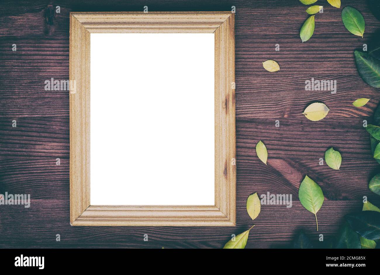 Empty wooden frame on brown wood surface Stock Photo - Alamy