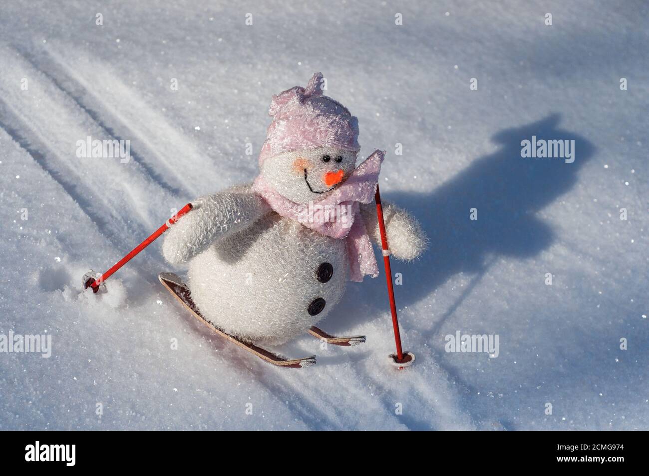 Snowman with skis hi-res stock photography and images - Alamy
