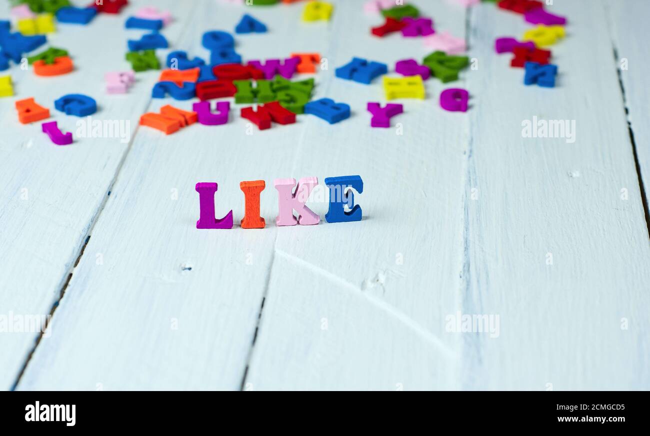 white wooden background with the word like Stock Photo - Alamy