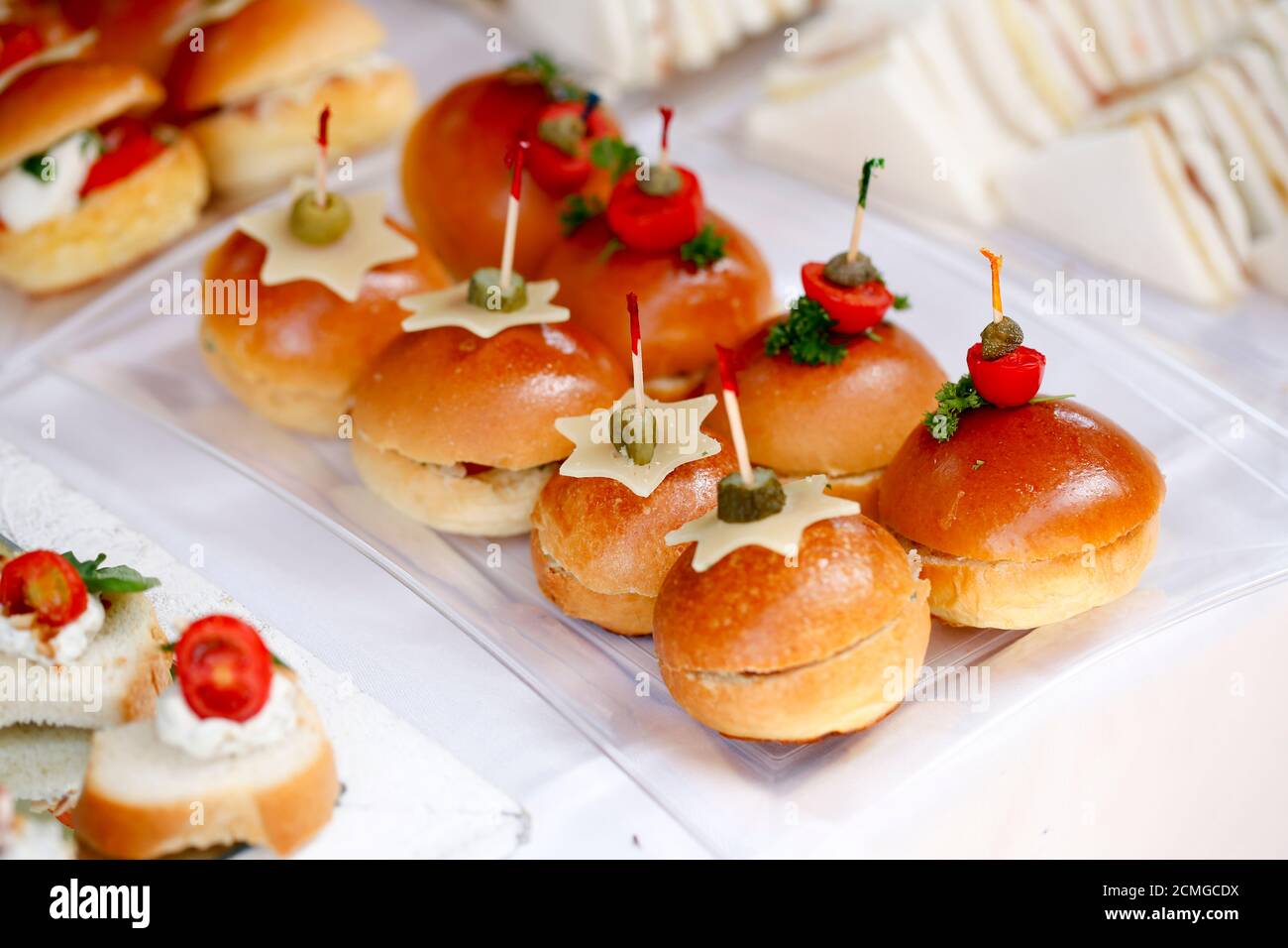 buffet for wedding ceremony with savory snacks and sandwiches. High ...