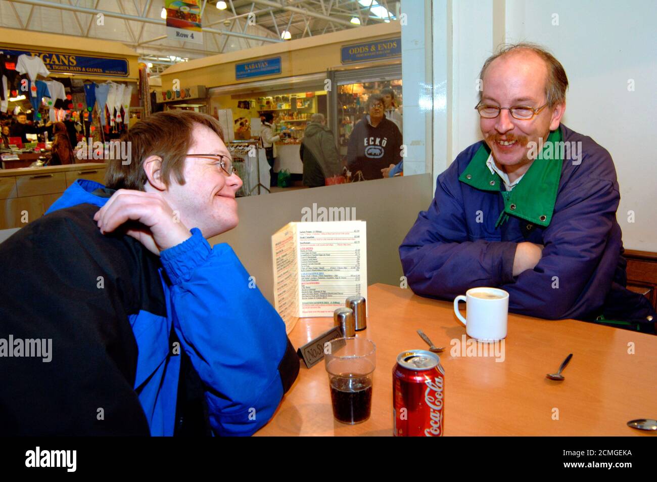 Group of men with learning disabilities in cafe; Bradford; Yorkshire UK ...