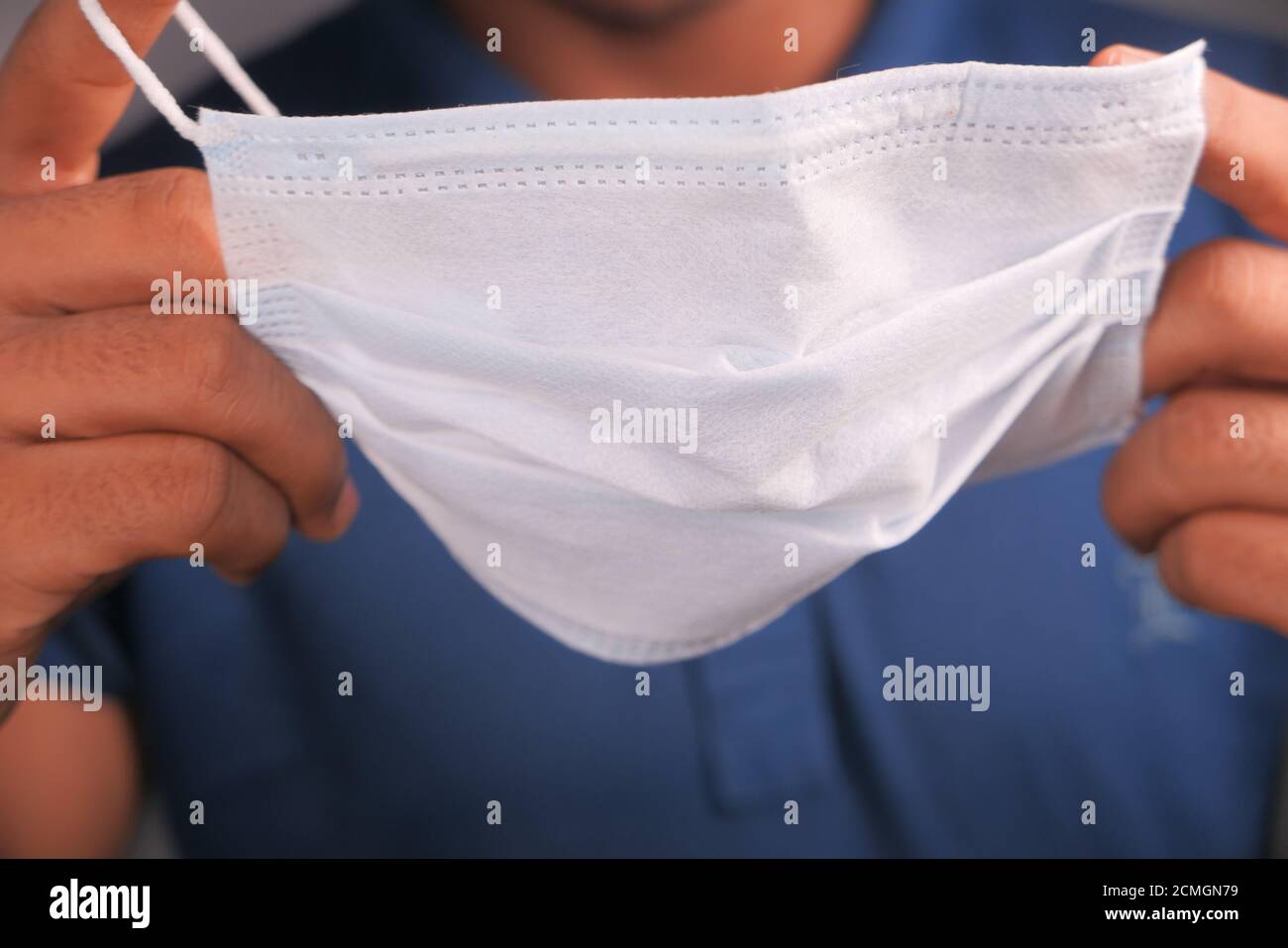 Adult male wearing face mask hi-res stock photography and images - Alamy