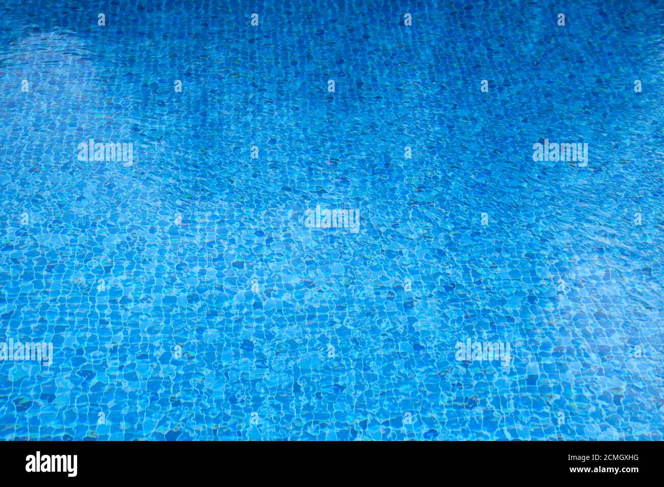 blue ripped water in swimming pool Stock Photo - Alamy