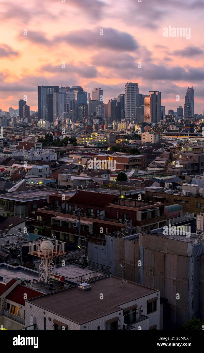 A view of the dense suburbs in Nakano and the Shinjuku skyline during a ...